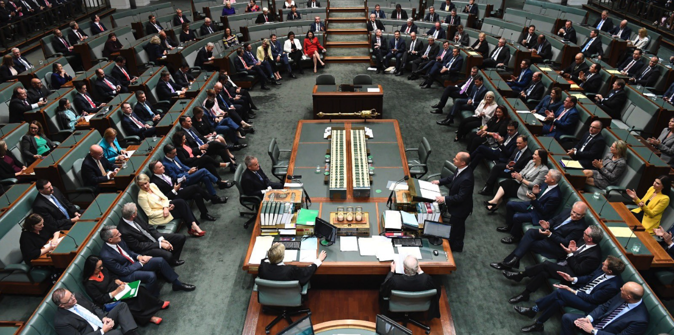 Australia's Federal Budget Returns to Surplus but Cuts Aid