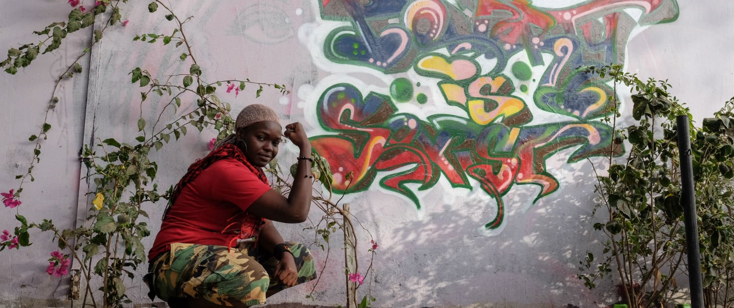 Breaking down walls by painting them: Senegal’s first lady of graffiti ...