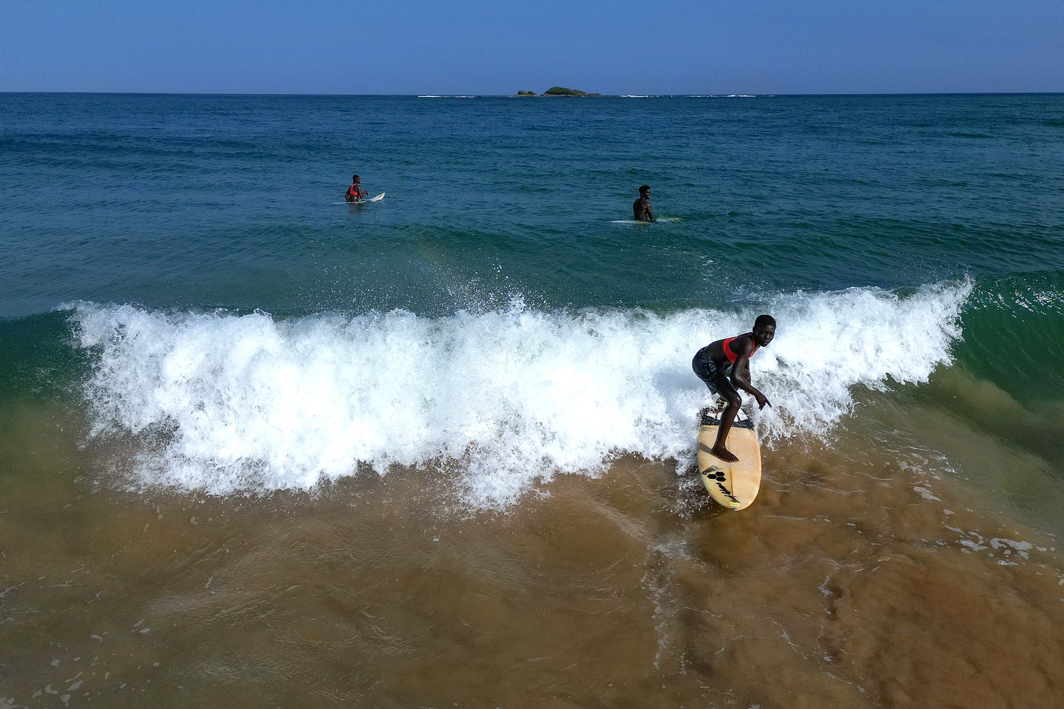 How Surfing Helps Girls in Ghana Reclaim Waves — and Their Time