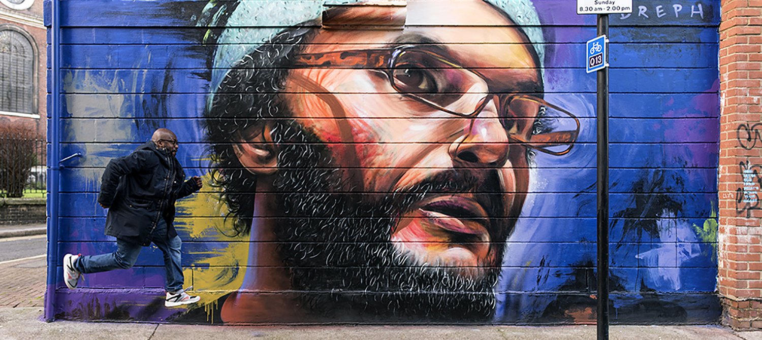 This Street Artist Is Putting Up Huge Murals of Immigrants Across the UK