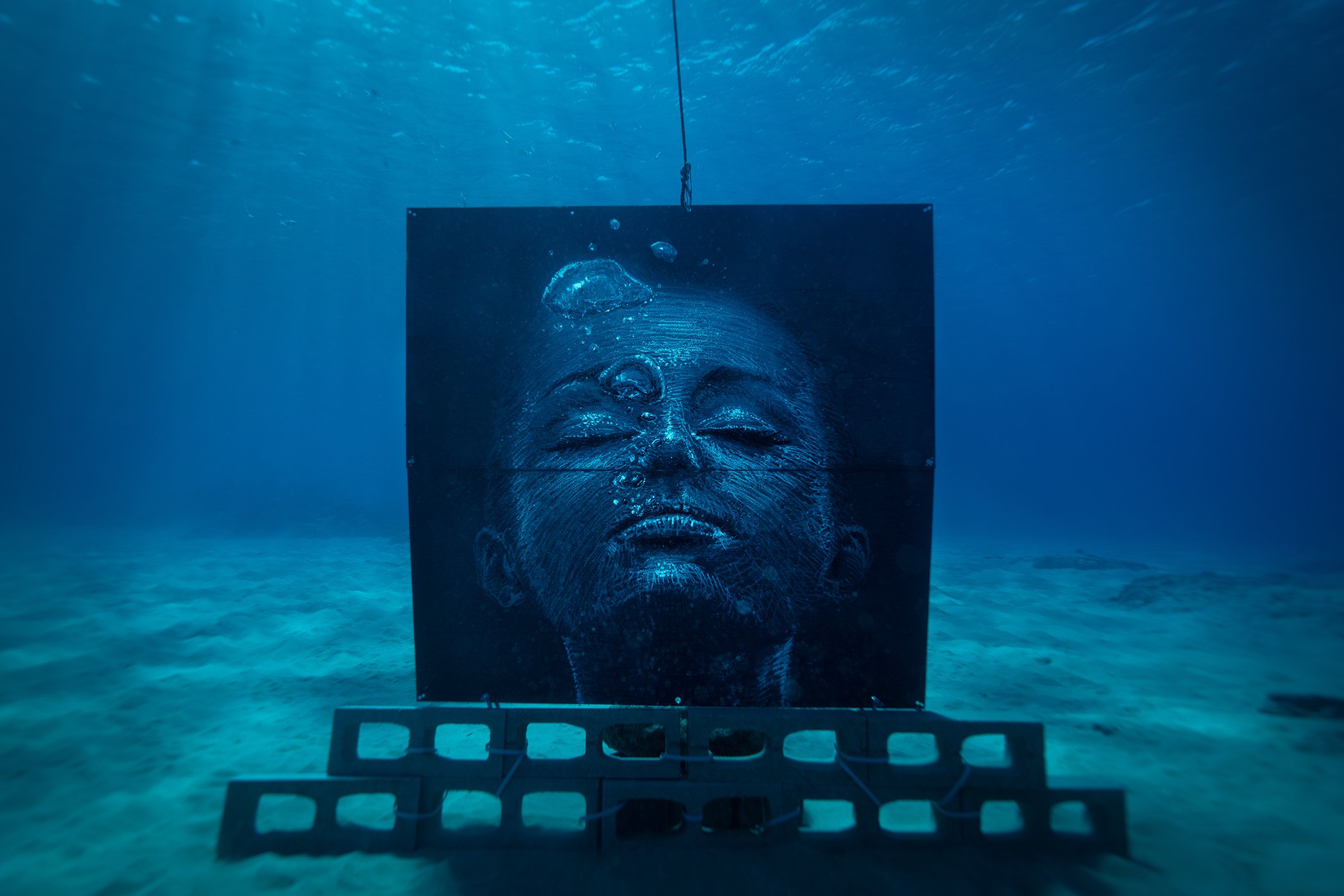 Dying Coral Reefs Inspired Artist Sean Yoro’s Underwater Murals